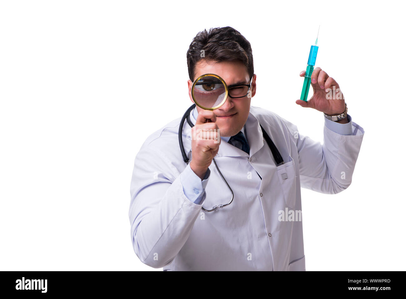 Young doctor with a magnifying glass and a syringe isolated on w Stock ...
