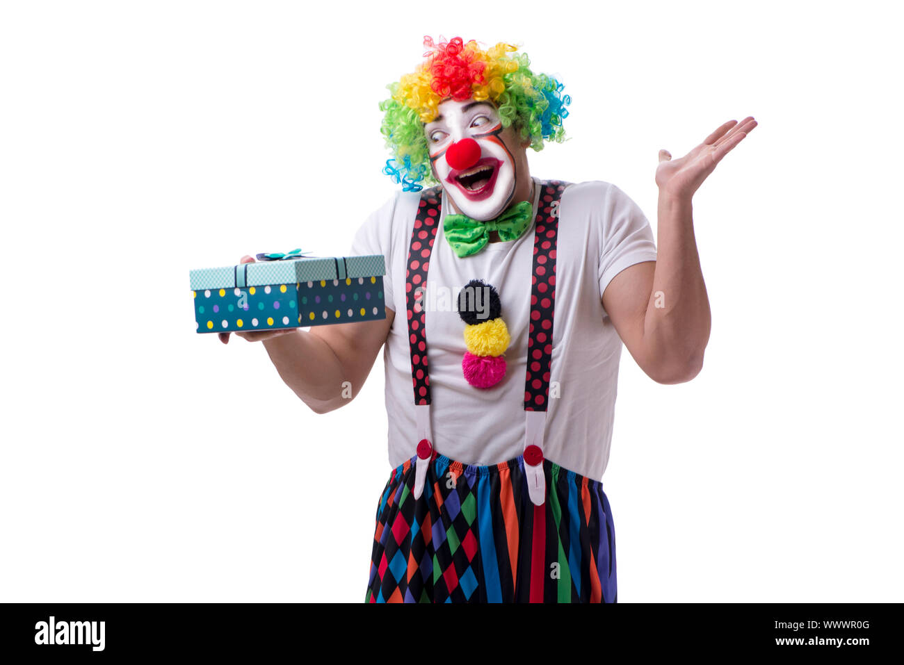 Funny clown with a gift present box isolated on white background Stock ...