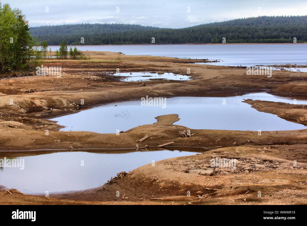 Discharge of water from hydropower, river bottom was exposed Stock ...