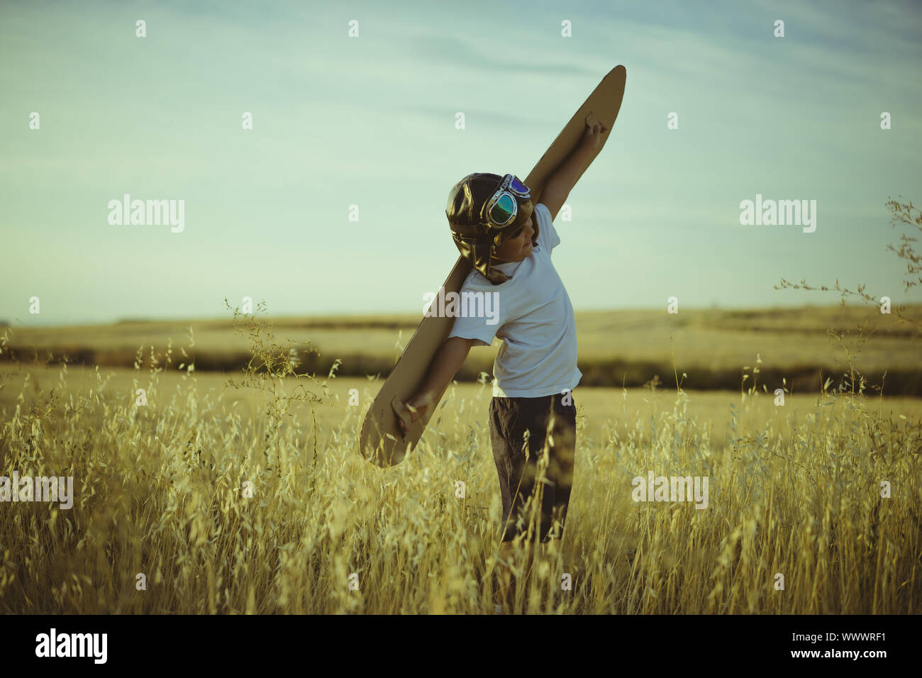 Freedom, Boy playing to be airplane pilot, funny guy with aviator cap ...