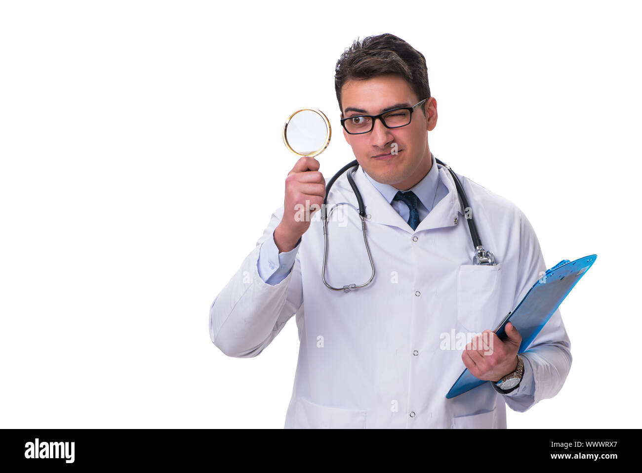 Young male doctor with a looking magnifying glass isolated on wh Stock ...