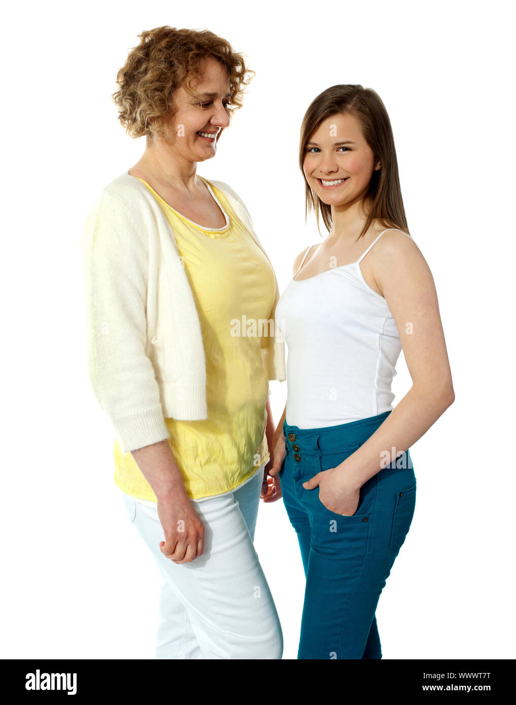 Glamorous portrait of two beauties. Mother looking at her pretty ...