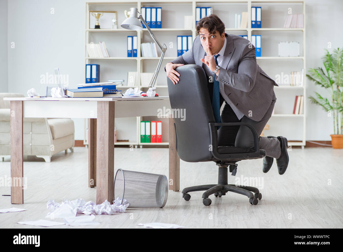 Businessman having fun taking a break in the office at work Stock Photo ...