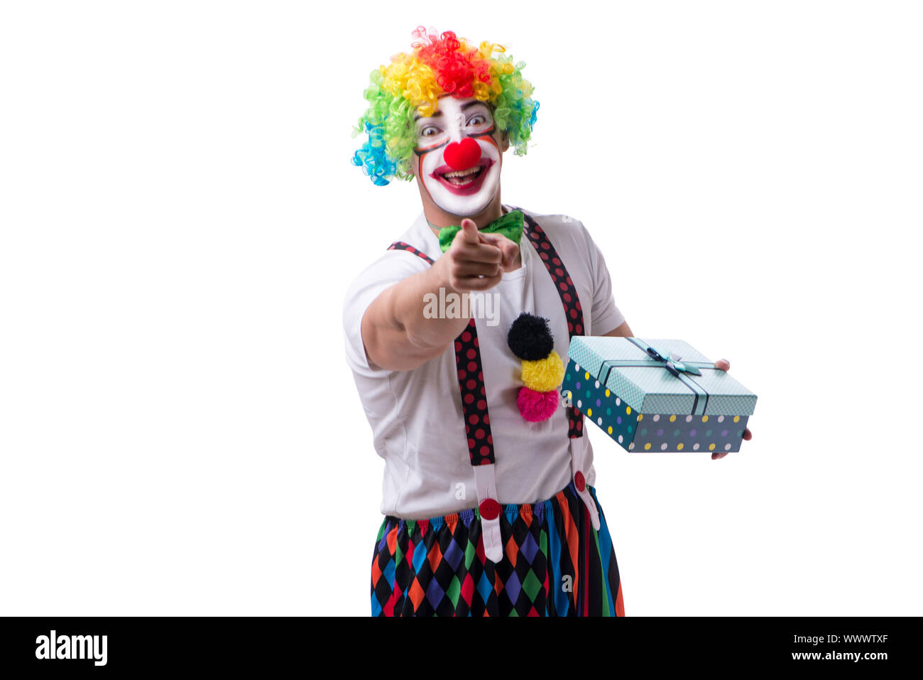 Funny clown with a gift present box isolated on white background Stock ...