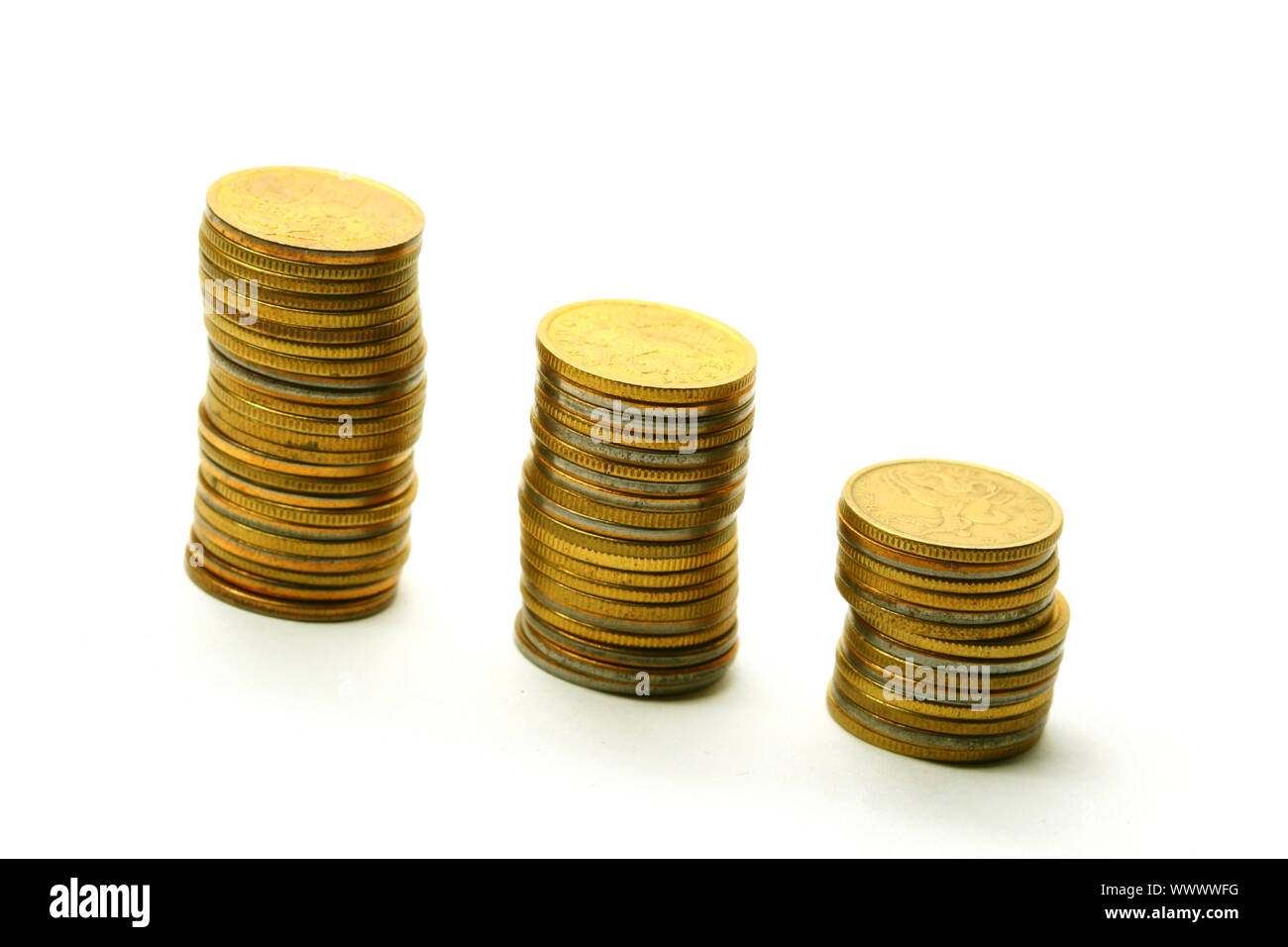 coins piles isolated on white background Stock Photo - Alamy
