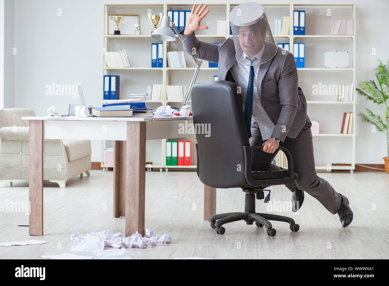 Businessman having fun taking a break in the office at work Stock Photo ...