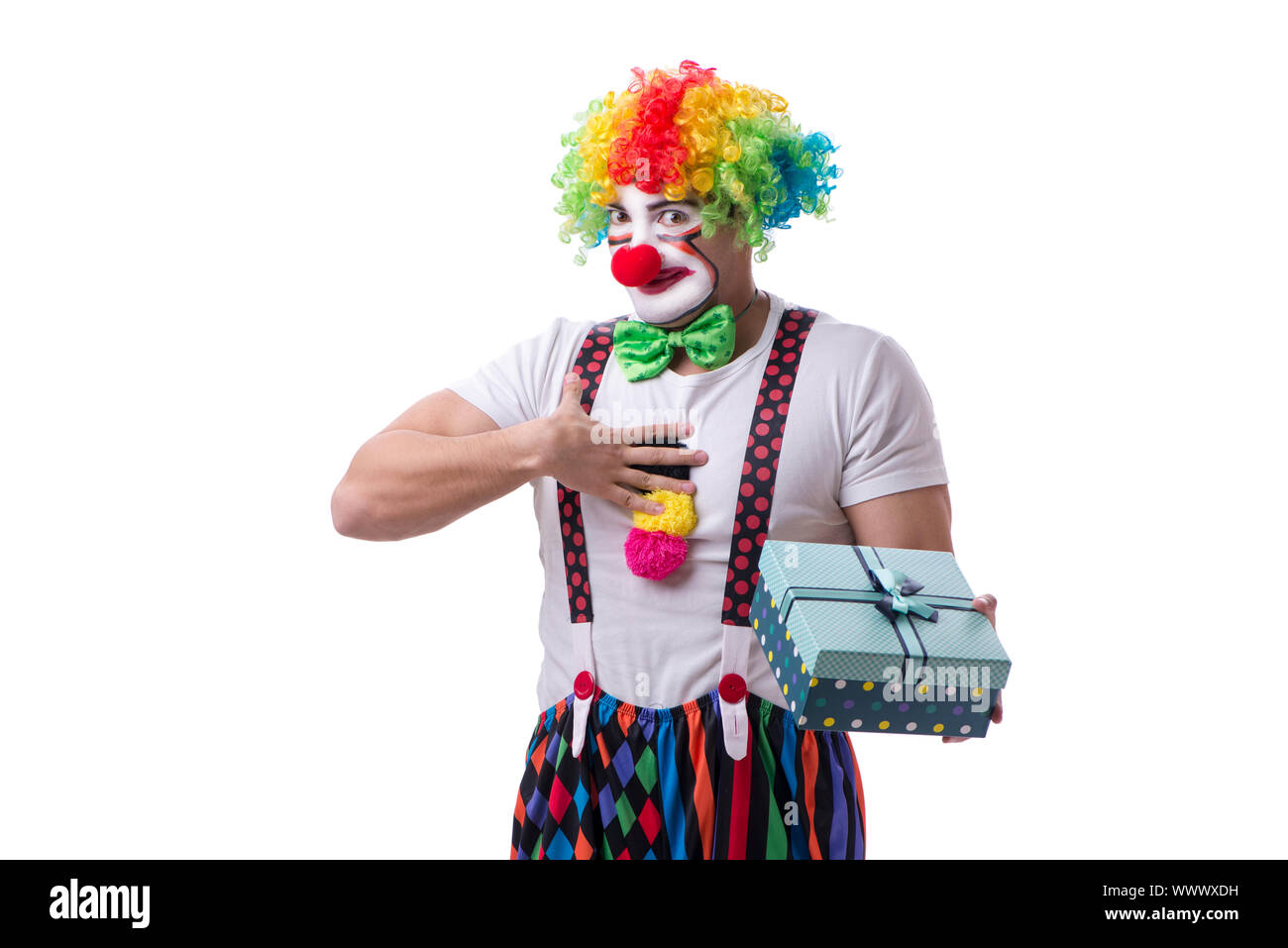 Funny clown with a gift present box isolated on white background Stock ...