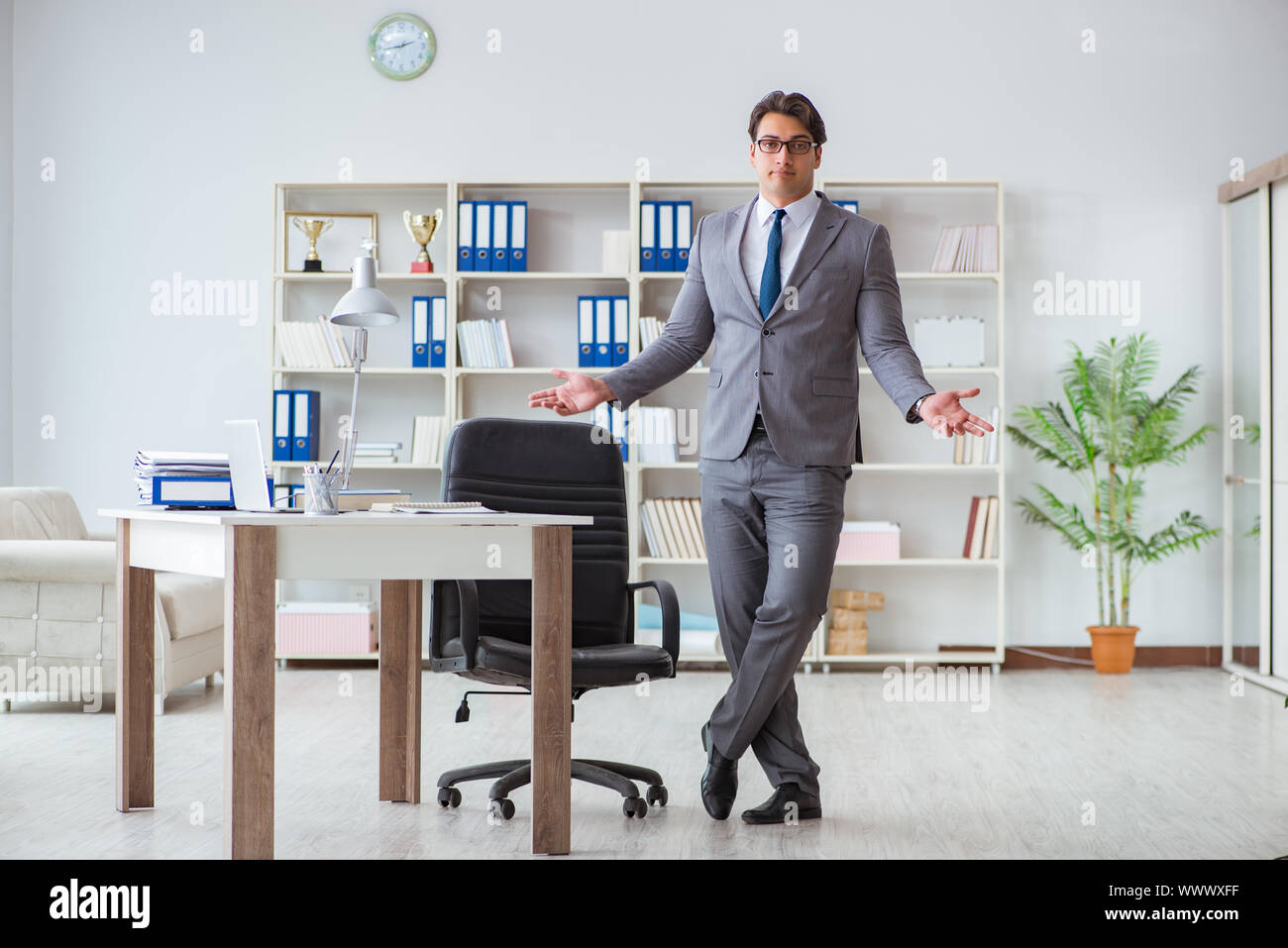 Businessman having fun taking a break in the office at work Stock Photo ...