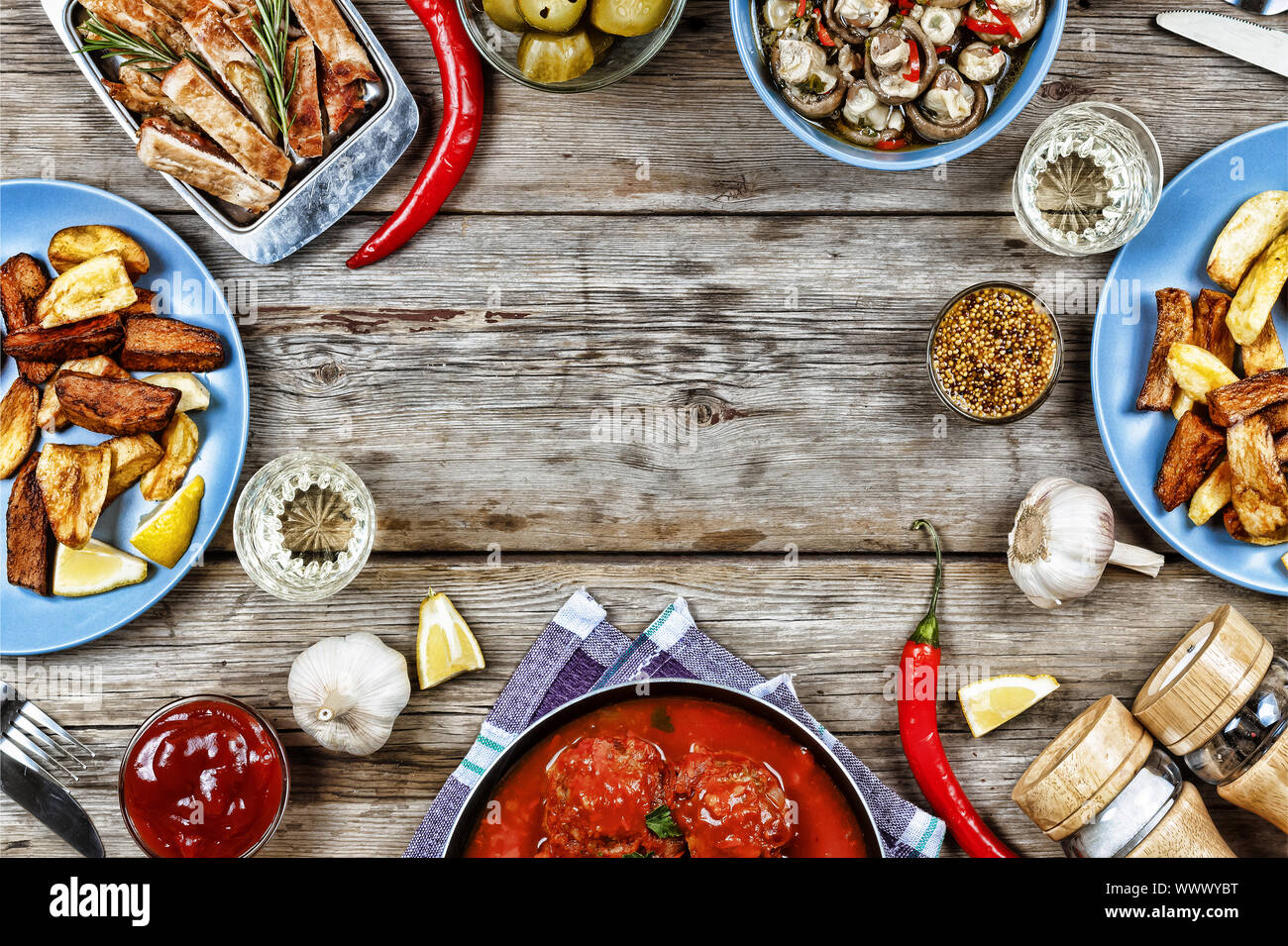 Dining table with a variety of meals Stock Photo - Alamy
