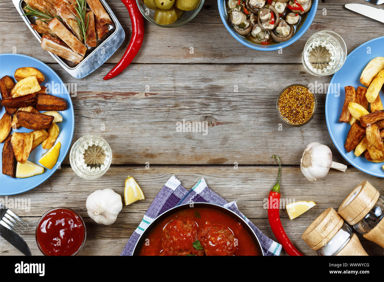 Dining table with a variety of meals Stock Photo - Alamy