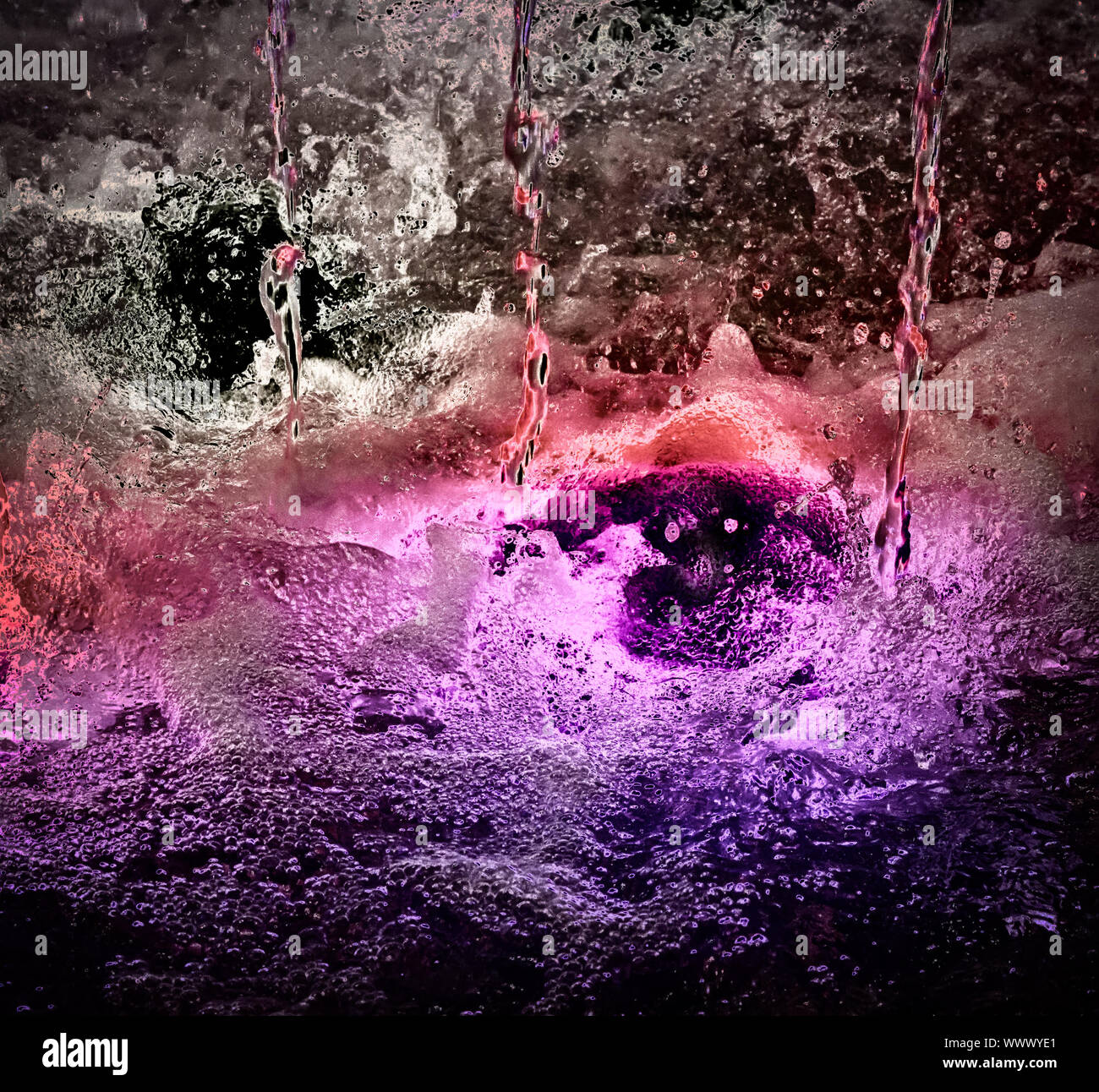 Background image: brightly lit jets of water Stock Photo - Alamy