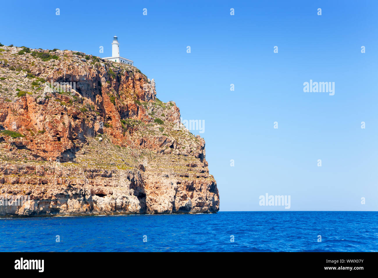 Formentera Faro de la Mola lighthouse view from sea Stock Photo - Alamy