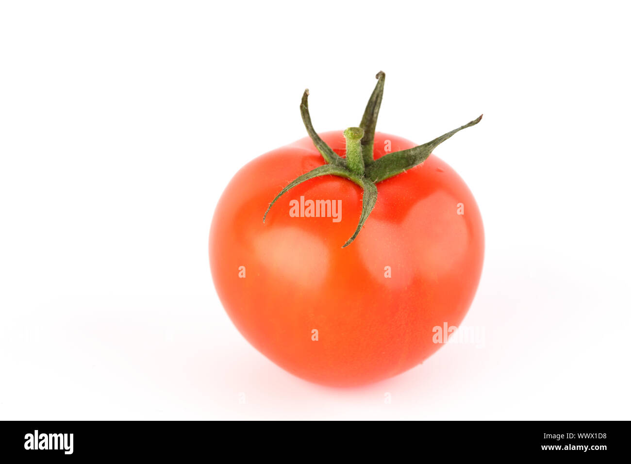 one tomato isolated on white background Stock Photo - Alamy