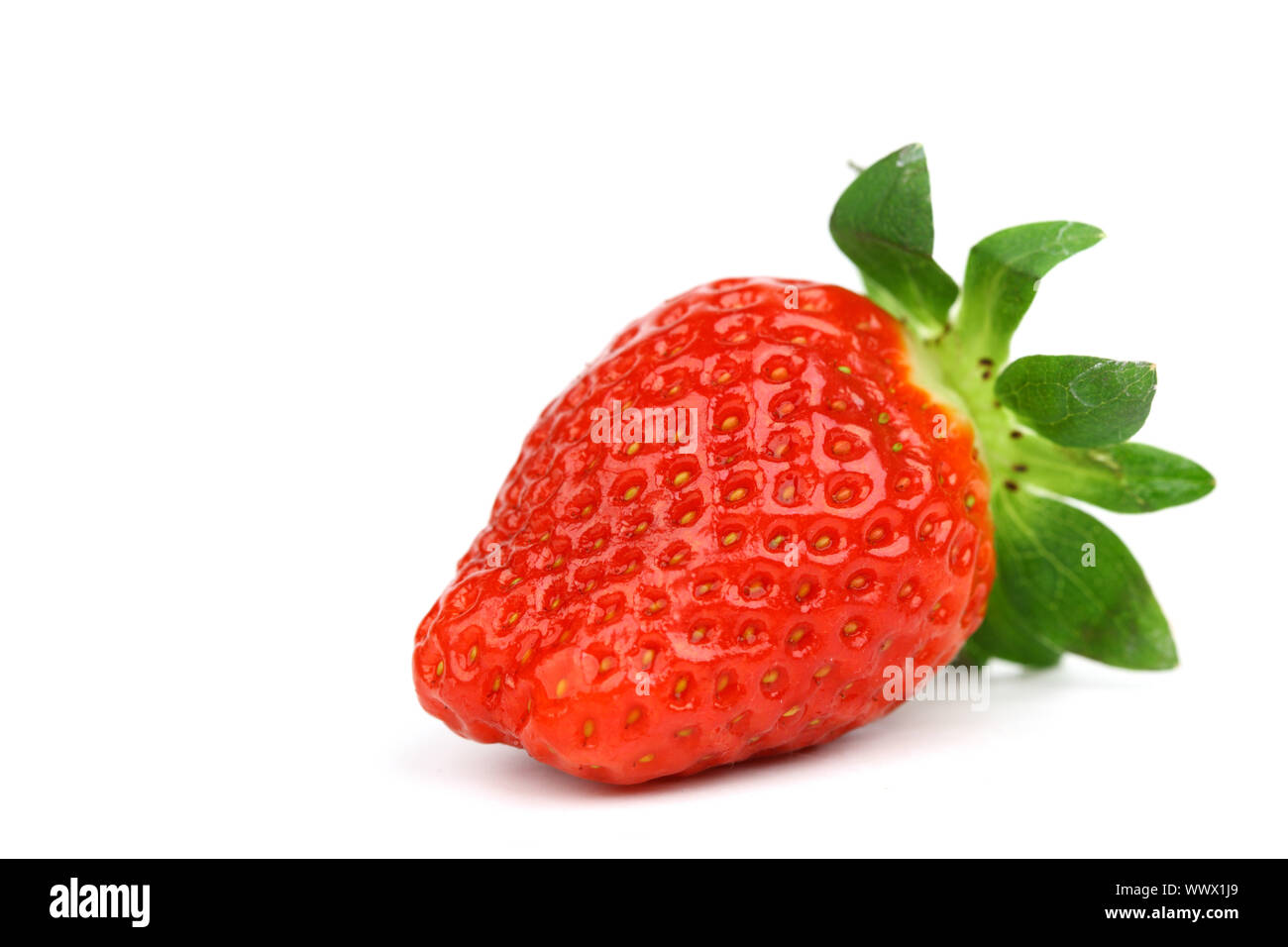 one strawberry isolated on white Stock Photo - Alamy