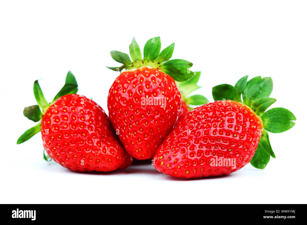 strawberry pile isolated on white background Stock Photo - Alamy