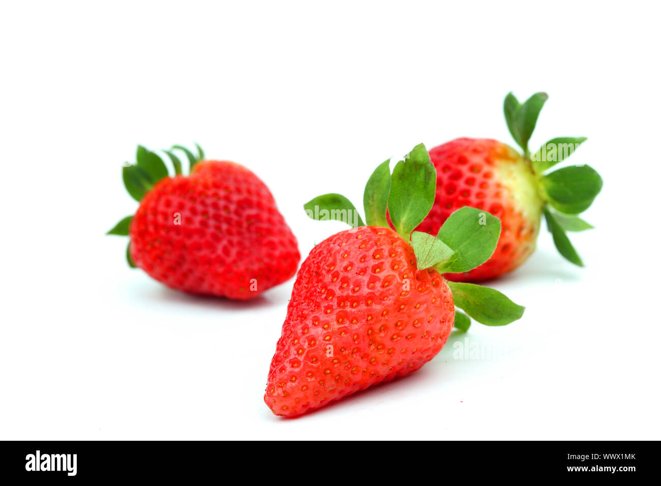 strawberry pile isolated Stock Photo - Alamy