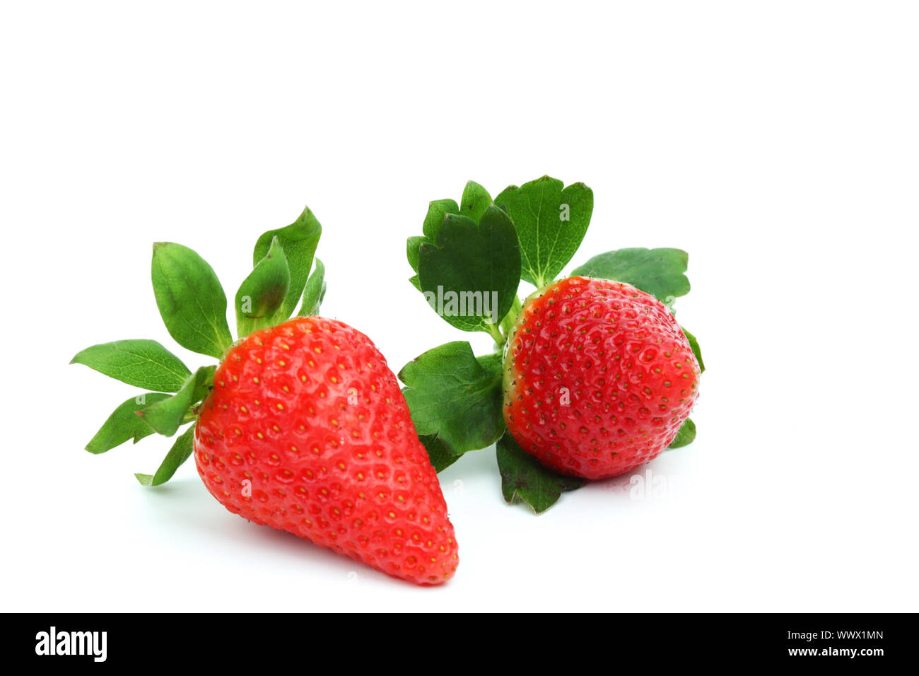 strawberry pile isolated Stock Photo - Alamy