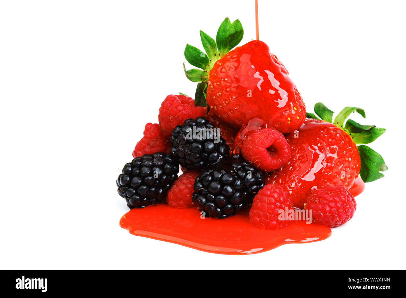 big berry pile in syrup isolated on white Stock Photo - Alamy