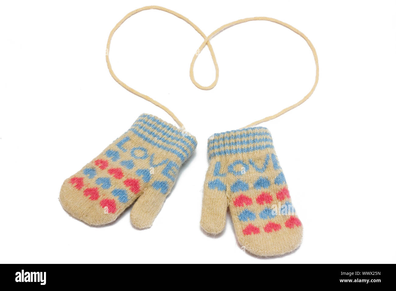 Little baby mittens/gloves isolated on white background Stock Photo - Alamy