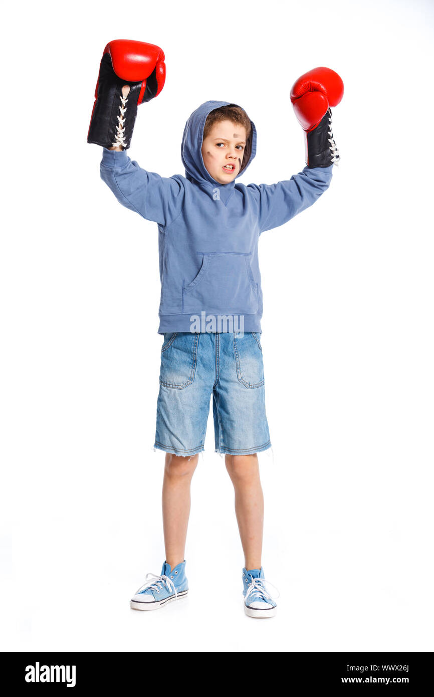 Emotional winner boxer - boy boxing wearing boxing gloves. Isolated on ...