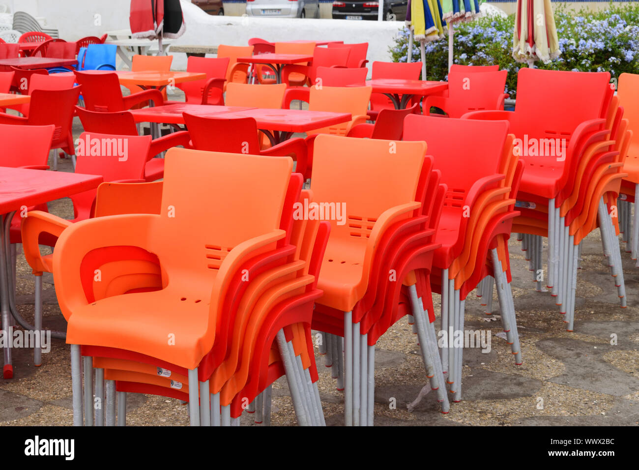 Orange plastic chairs hi-res stock photography and images - Alamy