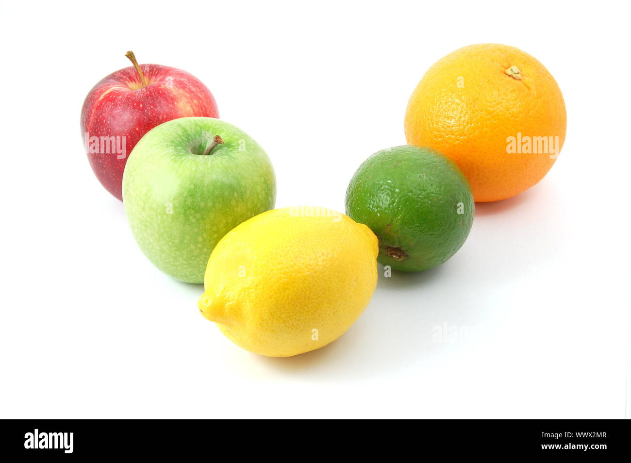 fruits like apple , lemon , citron orange and lime isolated on a white ...