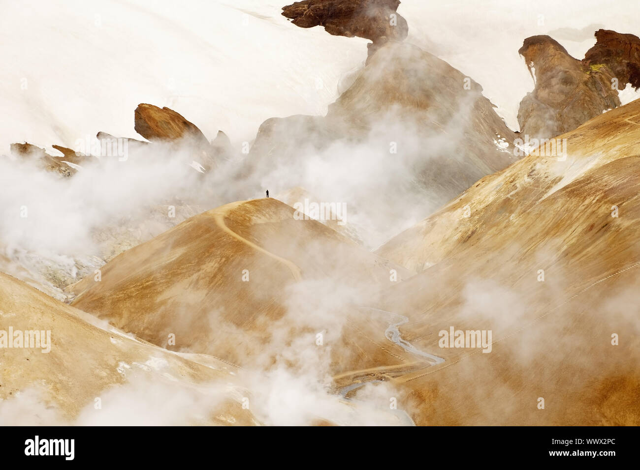 people in the geothermal area with Rhyolith mountains, Hveradalir ...