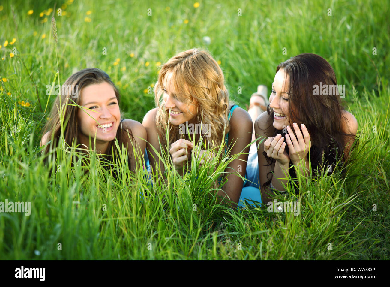 women fun on grass field Stock Photo - Alamy
