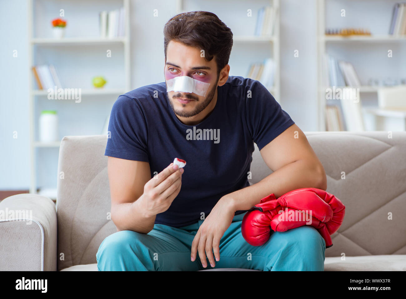 Young man defeated in sports game suffered loss with broken blee Stock ...