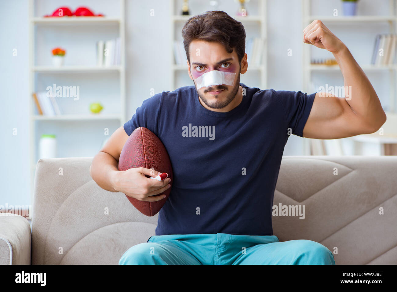 Young man defeated in sports game suffered loss with broken blee Stock ...