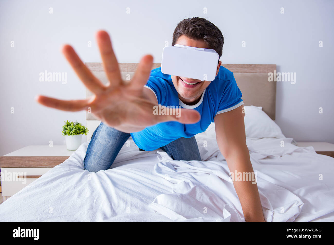 Immersed in virtual reality experience hi-res stock photography and ...