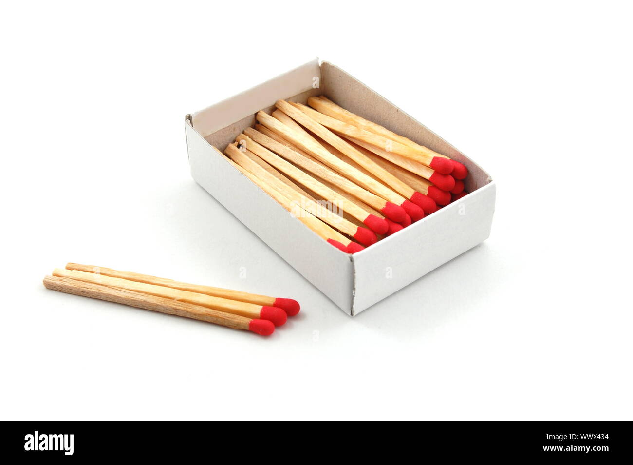 Some red matches isolated on a white background Stock Photo - Alamy