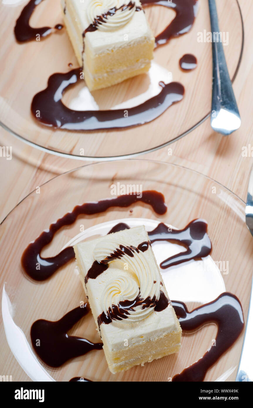 fresh cream cake closeup with chocolate sauce topping Stock Photo - Alamy