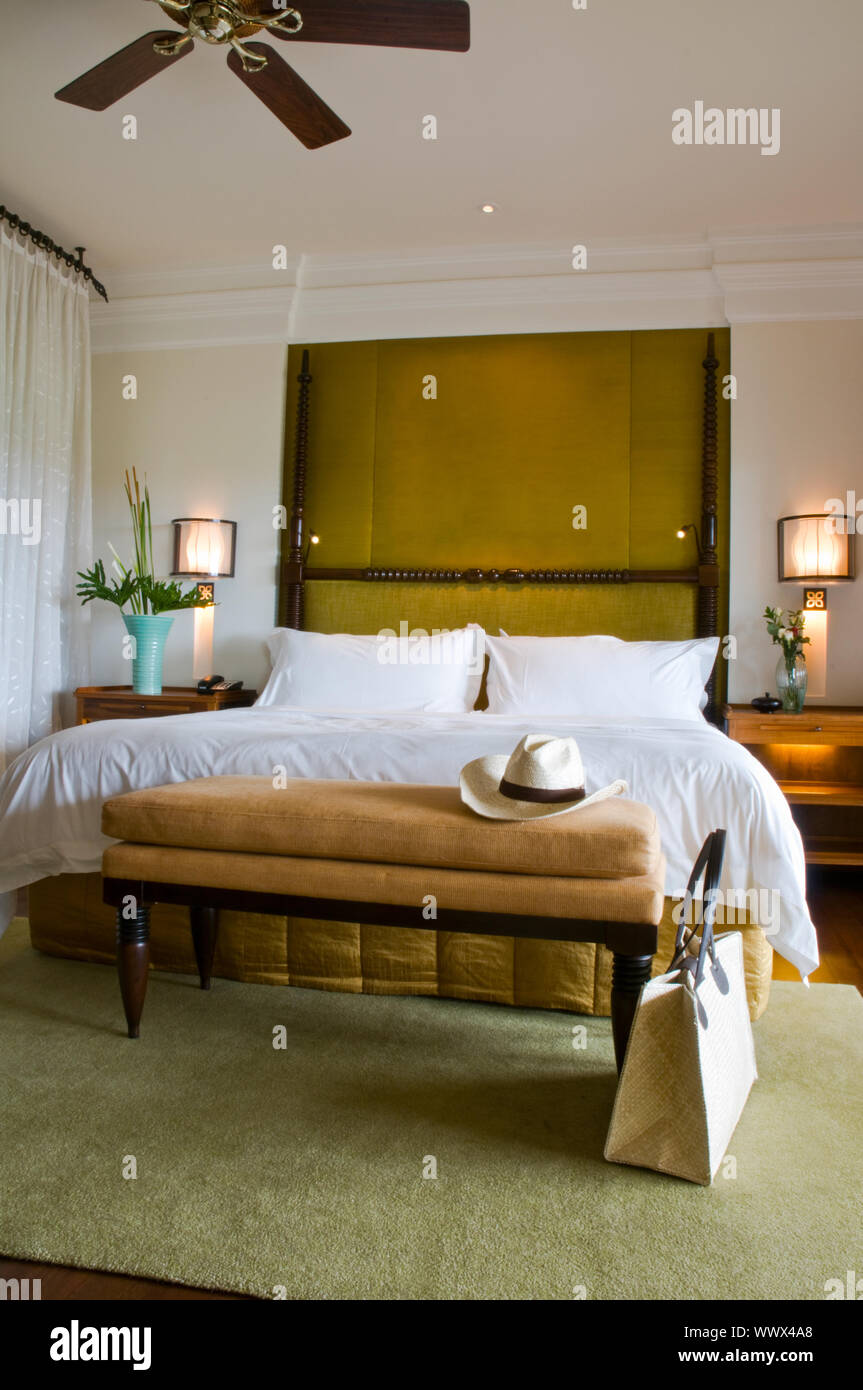 Suite bed room of a luxury resort with ceiling fan Stock Photo - Alamy