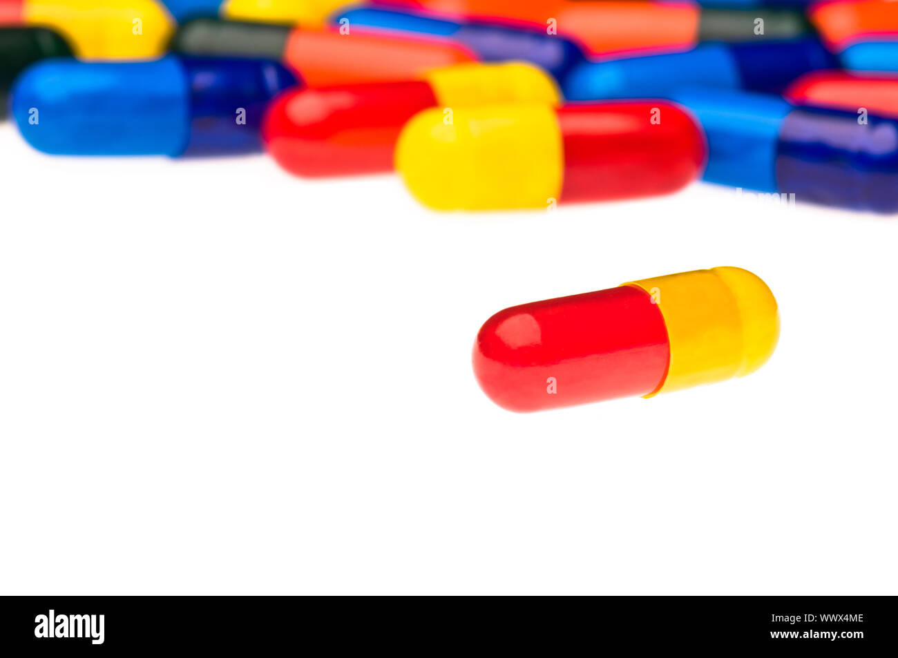 Yellow and red capsule hi-res stock photography and images - Alamy