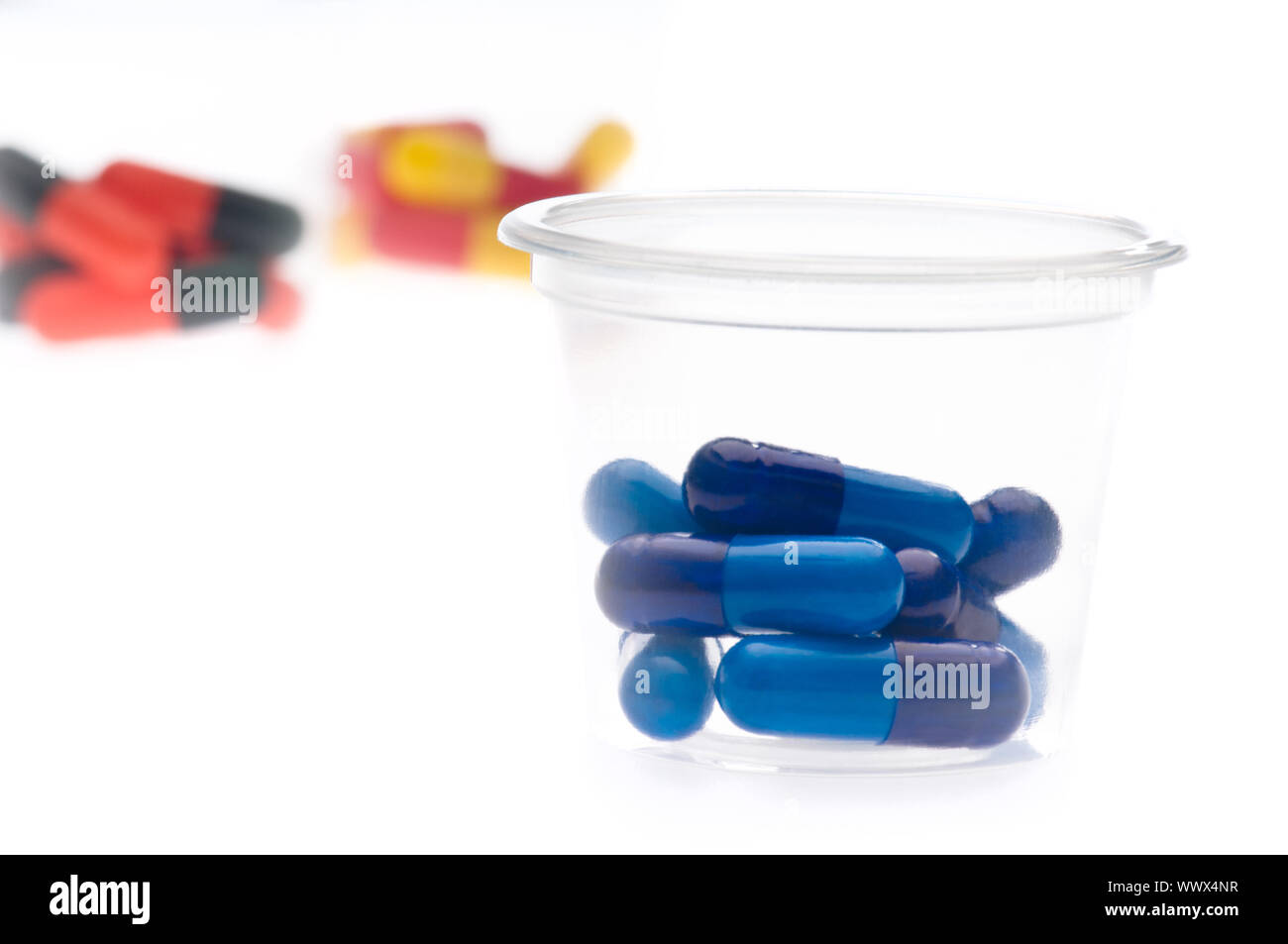 Red blue capsules in hi-res stock photography and images - Alamy