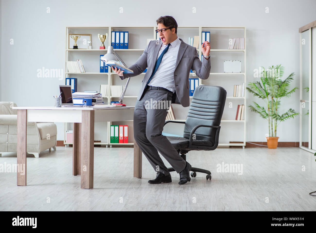 Holding paycheck in office hi-res stock photography and images - Alamy