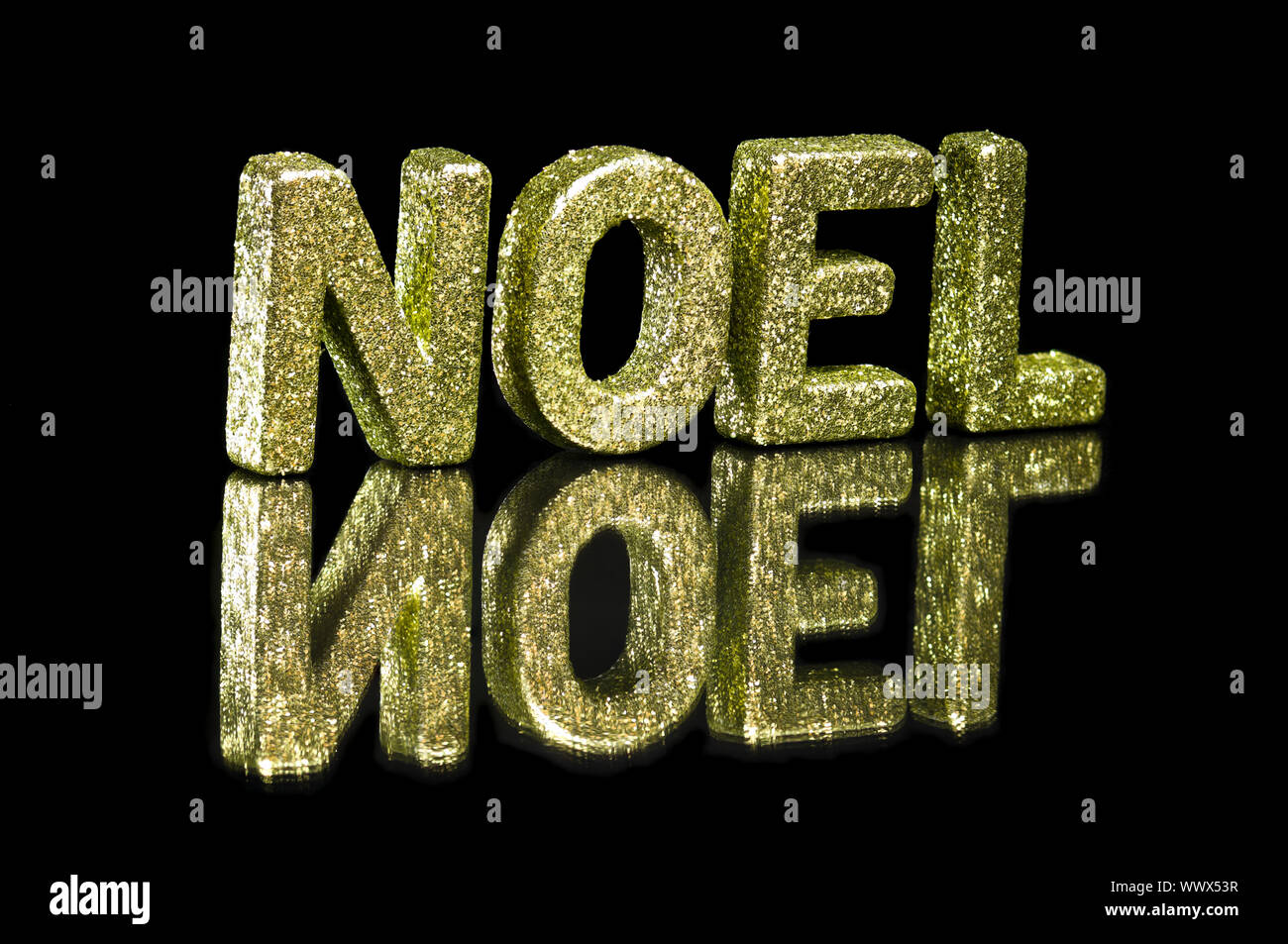 In capital letter written noel, glitter effect Stock Photo - Alamy