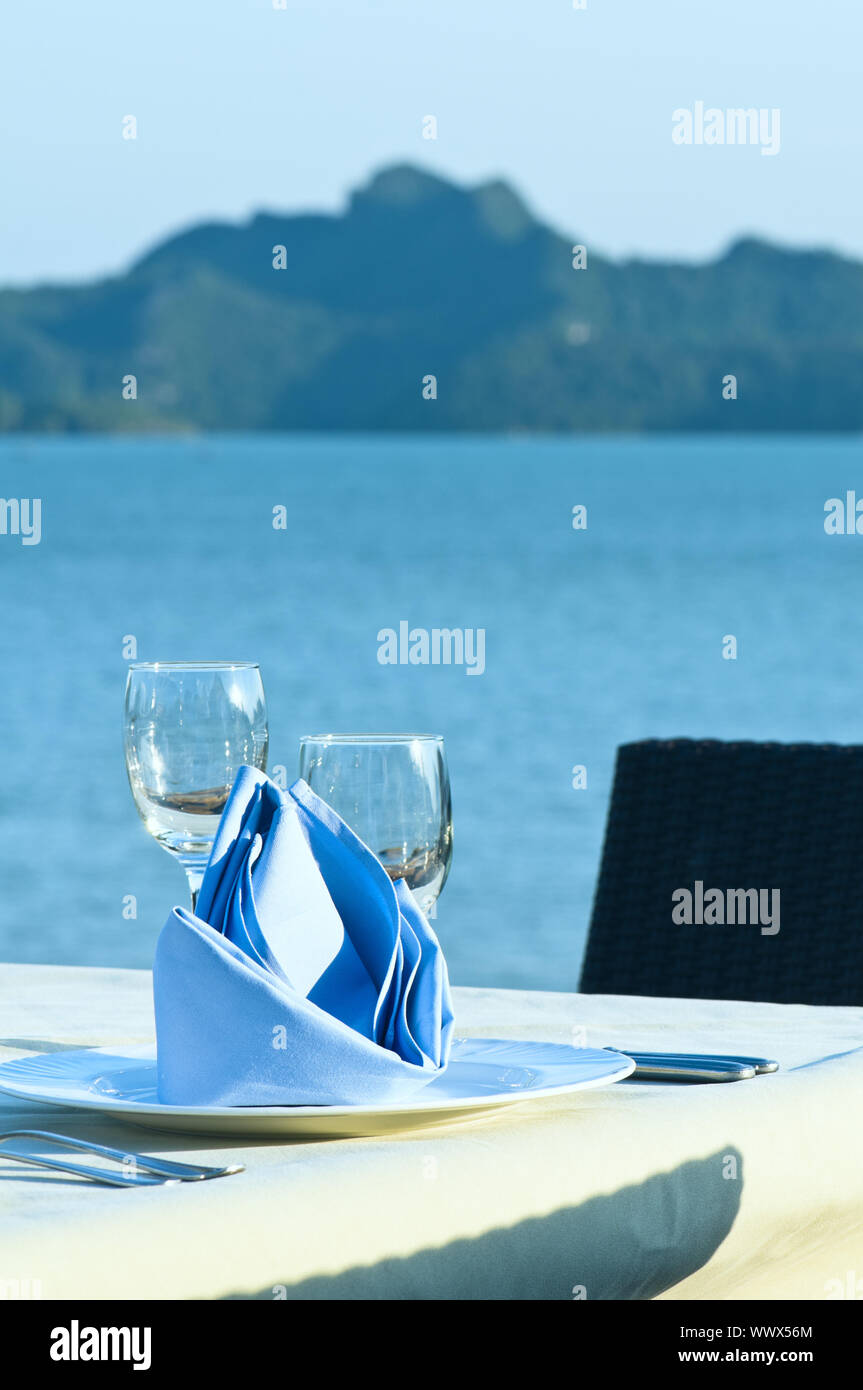 Open-air table setting for meals with elegant dishware Stock Photo - Alamy
