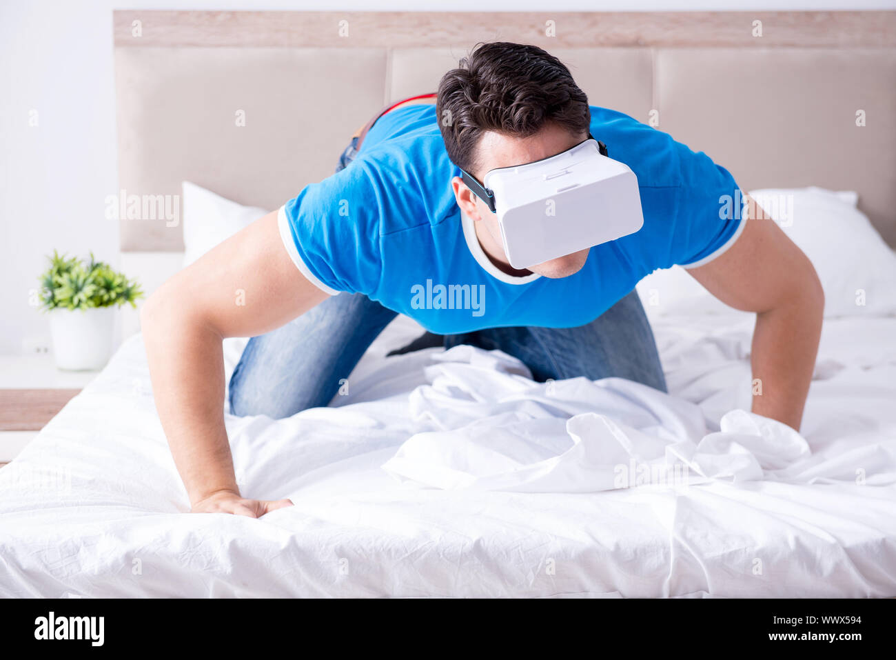 Immersed in virtual reality experience hi-res stock photography and ...