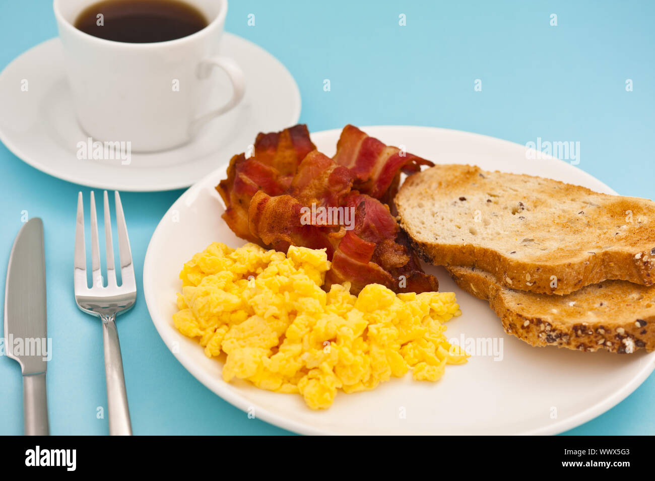 American breakfast, bacon scrambled egg and coffee Stock Photo - Alamy