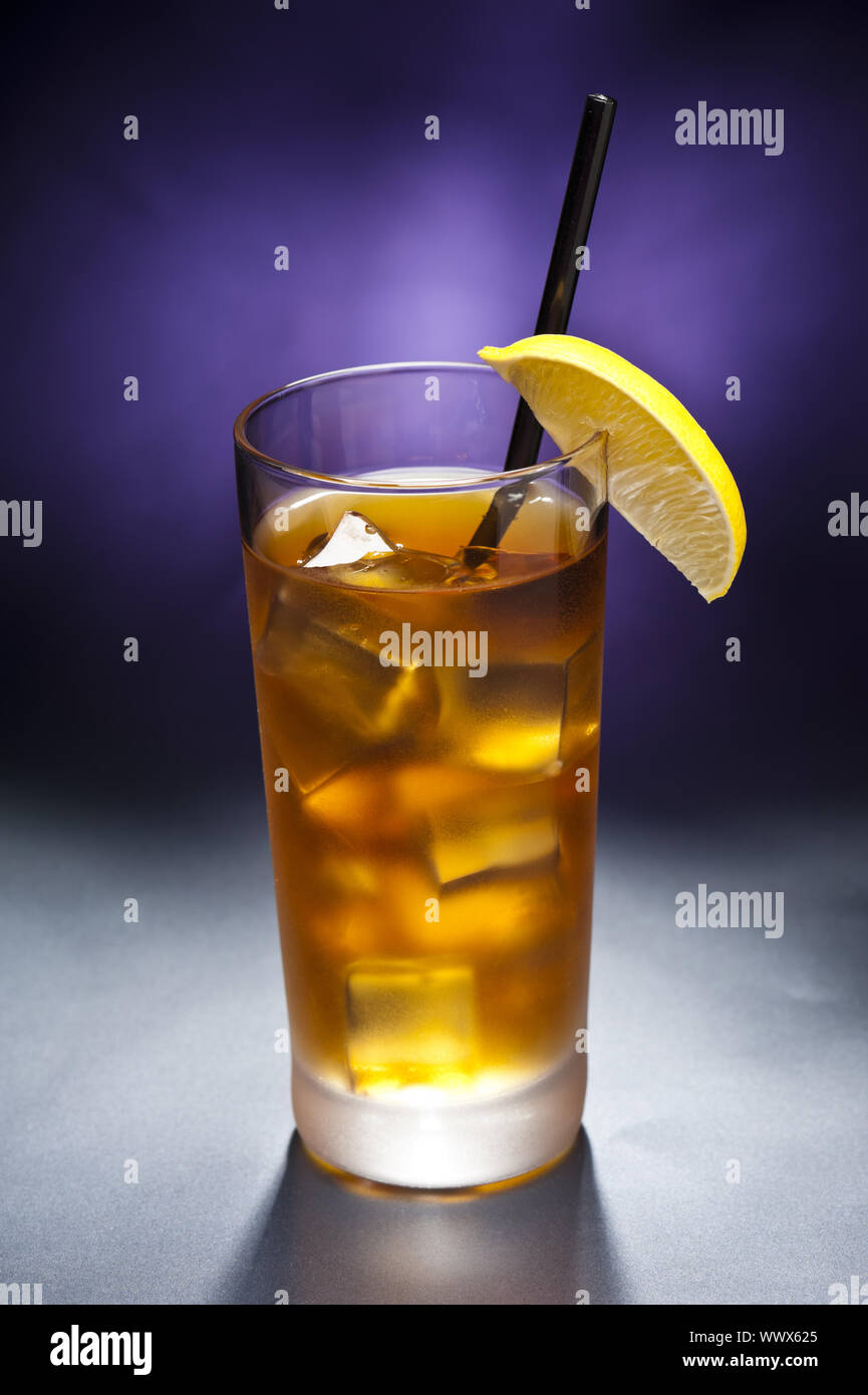Long Island Iced tea infront of artistic background Stock Photo - Alamy