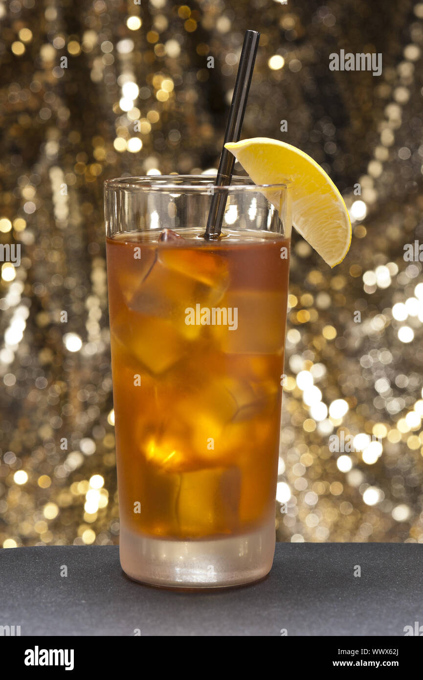 Long Island Iced tea infront of artistic background Stock Photo - Alamy