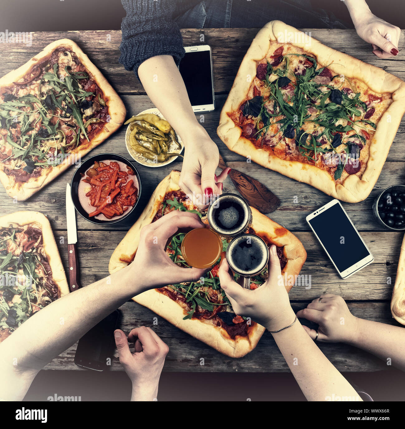 Eating Concept. Enjoying dinner with friends, Top view of group of ...