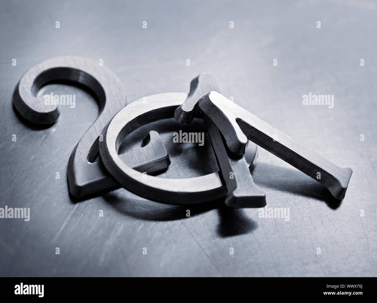 Metallic letters for year 2011 taken apart Stock Photo - Alamy