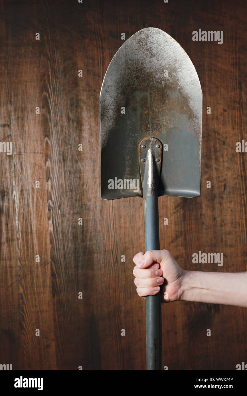 Holds shovel holding hi-res stock photography and images - Alamy
