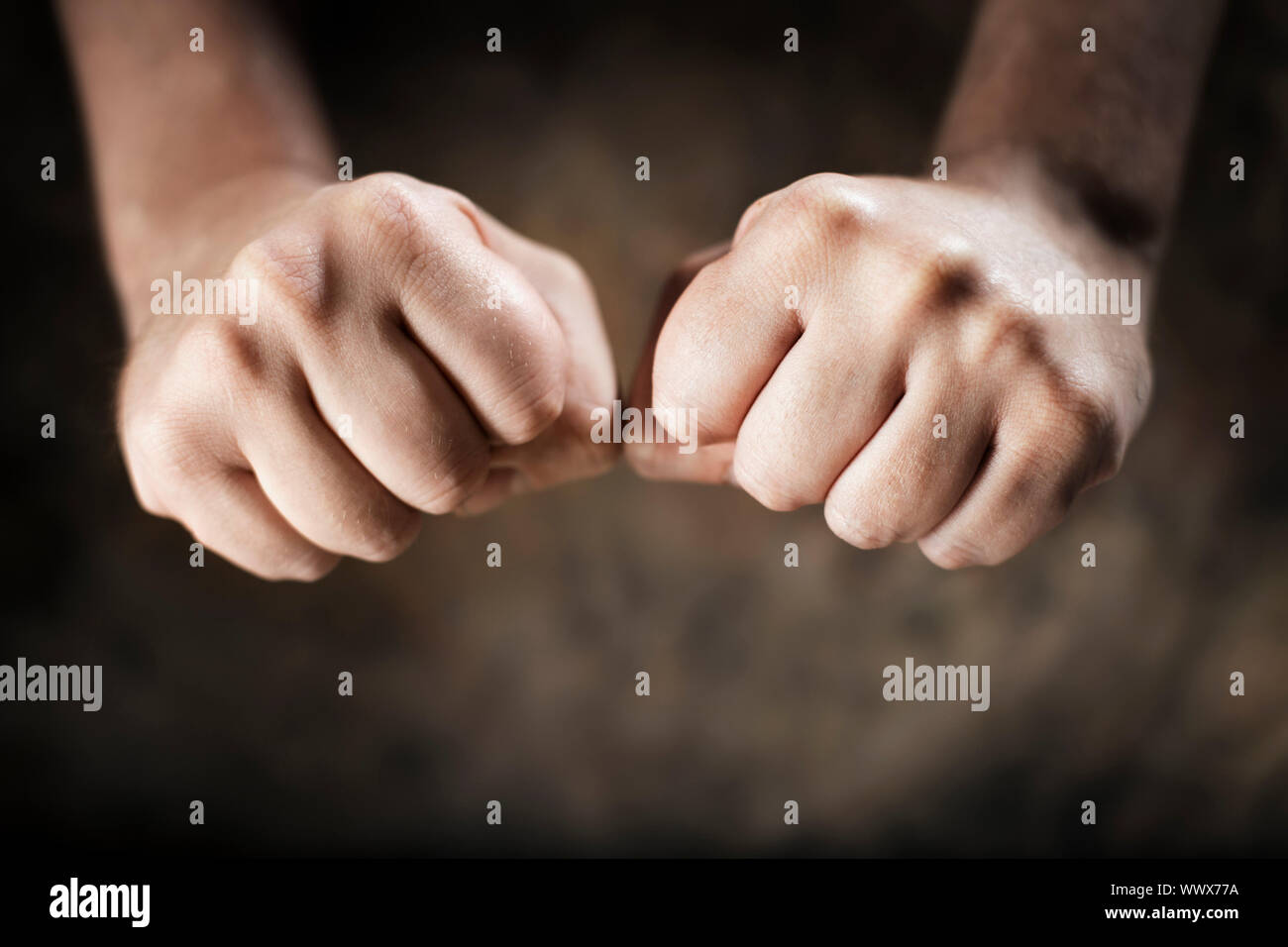 Man clenching his hands to fists Stock Photo - Alamy