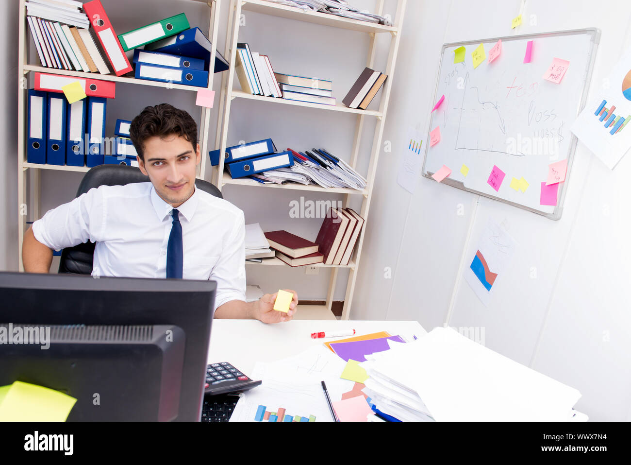Male office worker in piles hi-res stock photography and images - Alamy