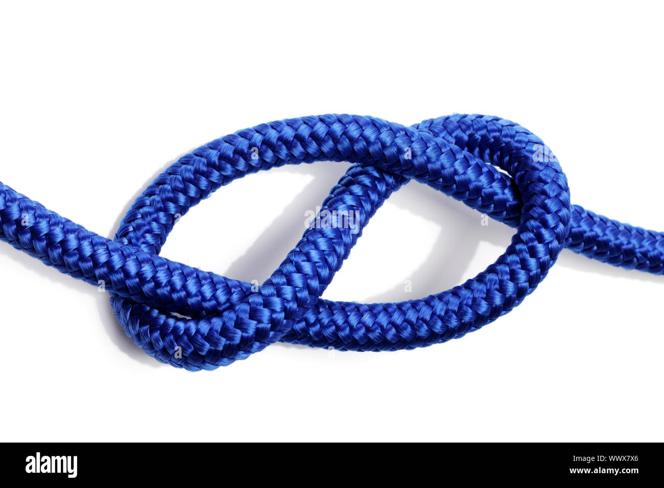 Figure-eight knot made with blue rope on white background Stock Photo ...