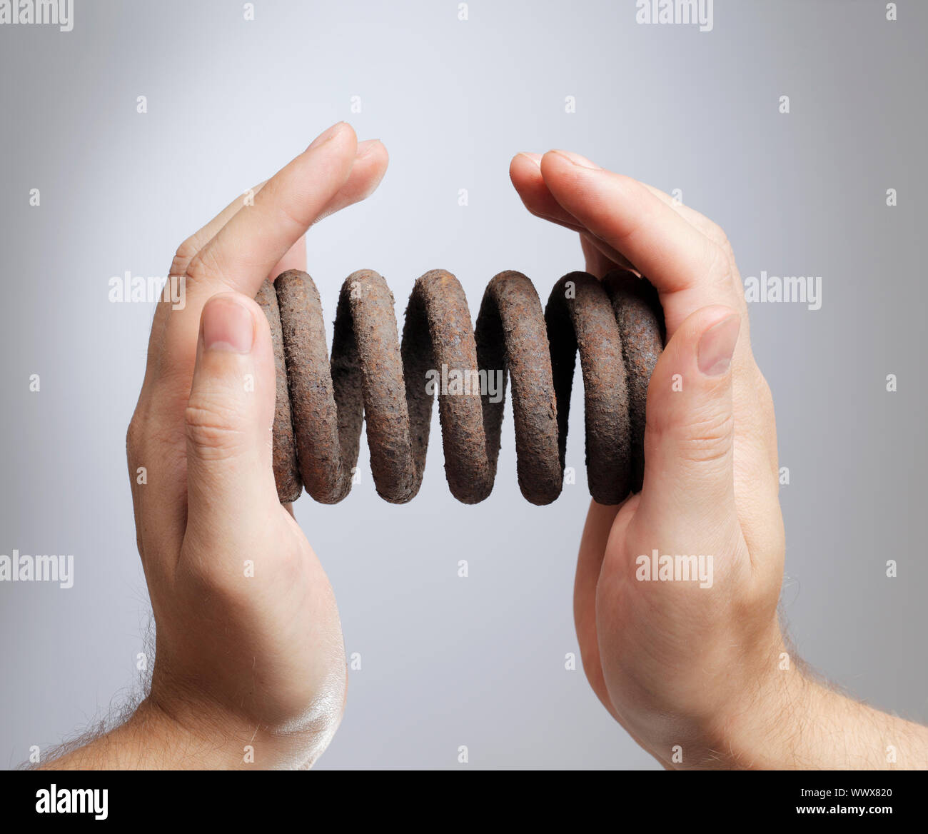 Compressing Spring High Resolution Stock Photography and Images - Alamy